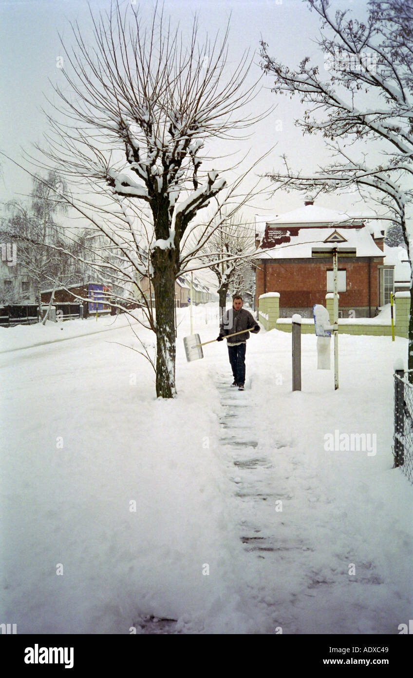 man shoveling snow Stock Photo - Alamy