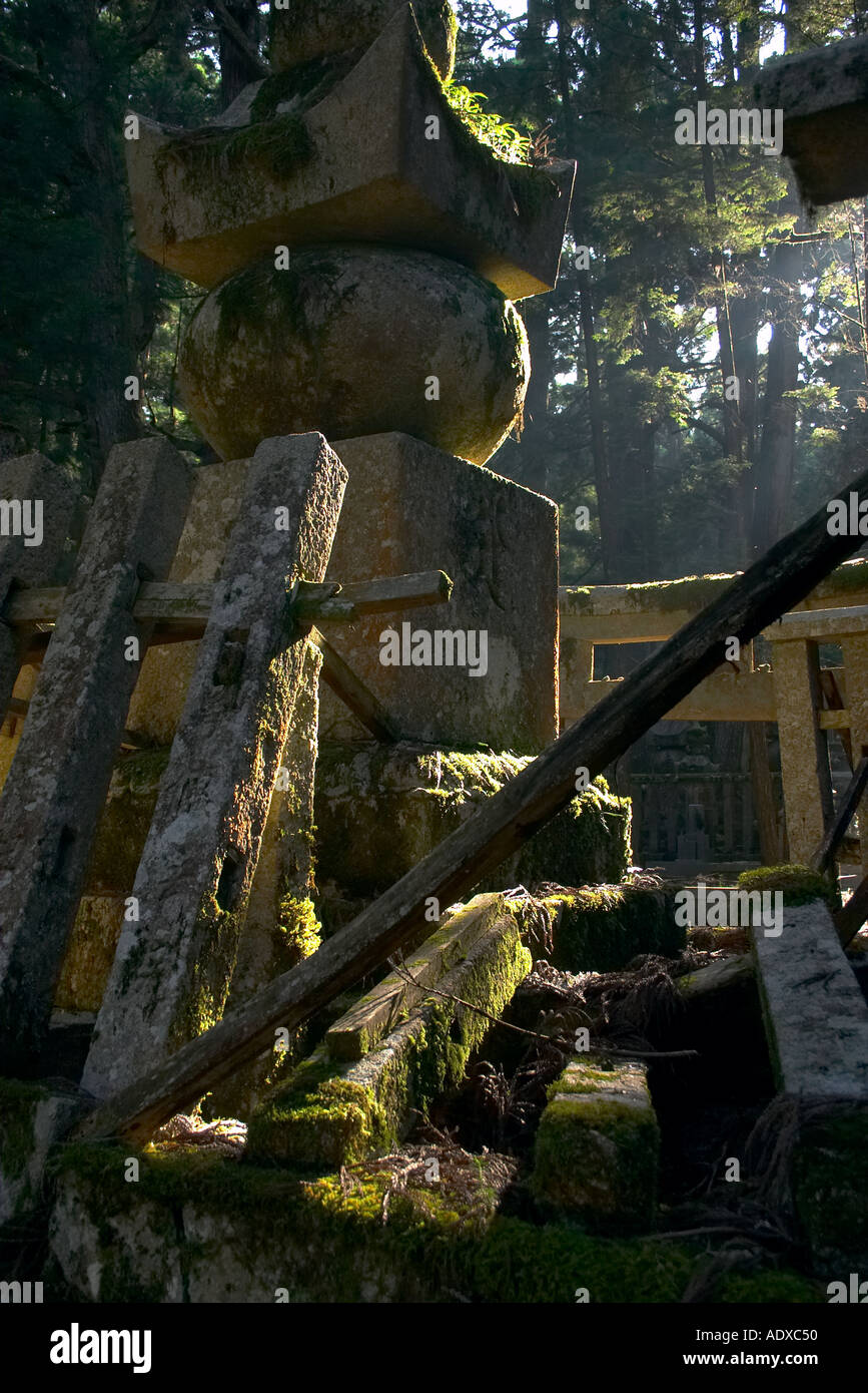 A ruined stone structure at the huge graveyard at Koya san in Wakayama ...