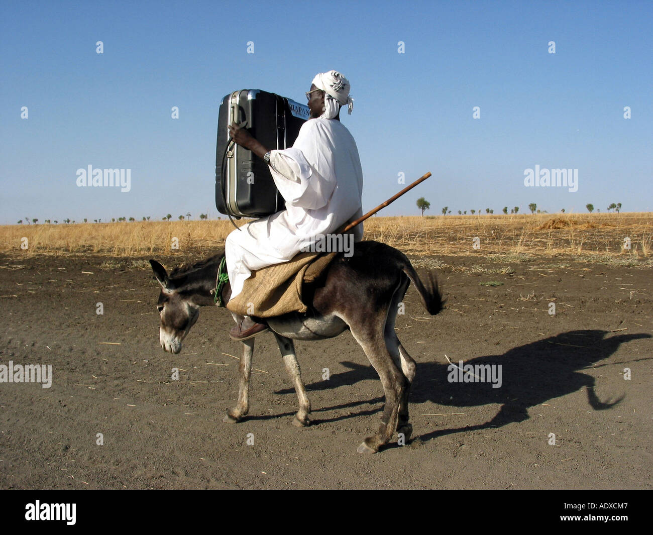 He is moving with his belongings to Chad to seek safety Stock Photo - Alamy