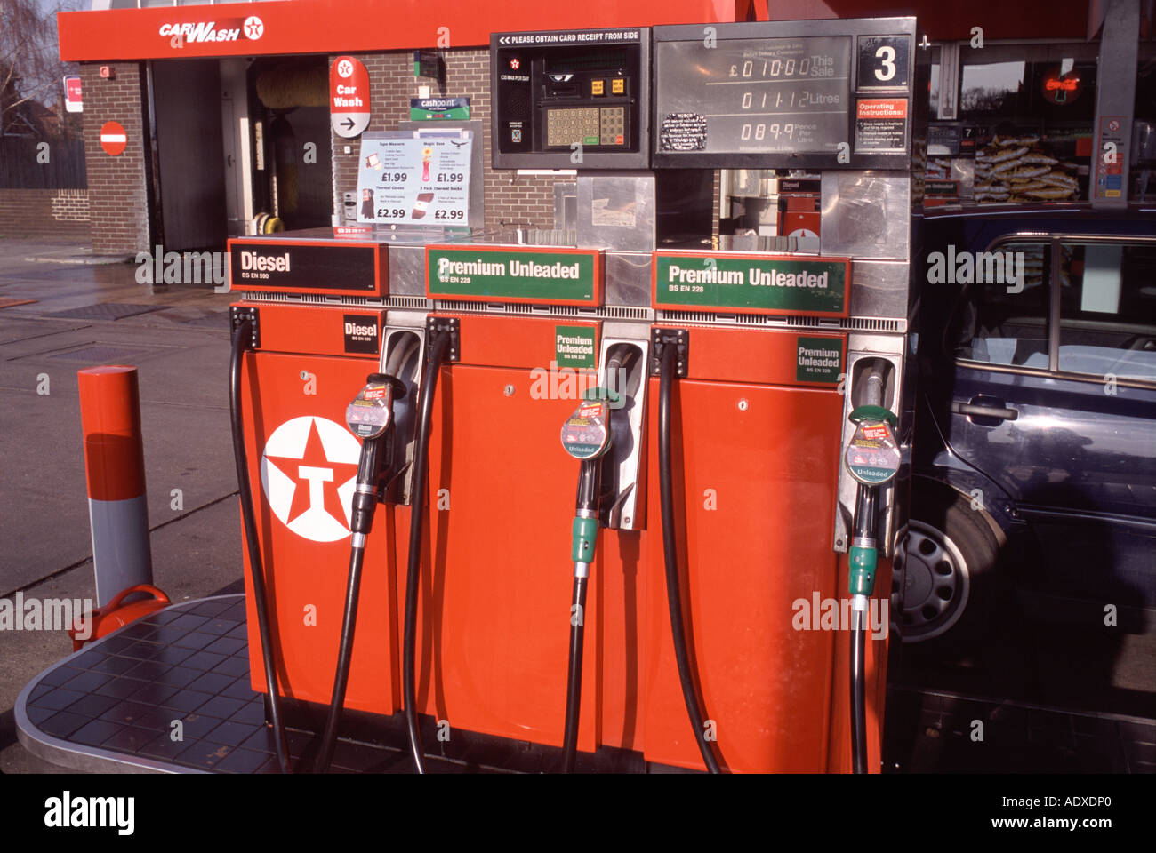 Fuel pumps in a garage Stock Photo - Alamy