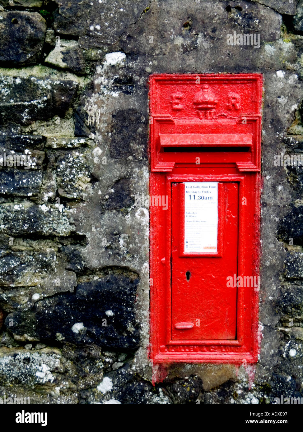RED POST BOX SET IN AN OLD BRICK WALL Stock Photo - Alamy