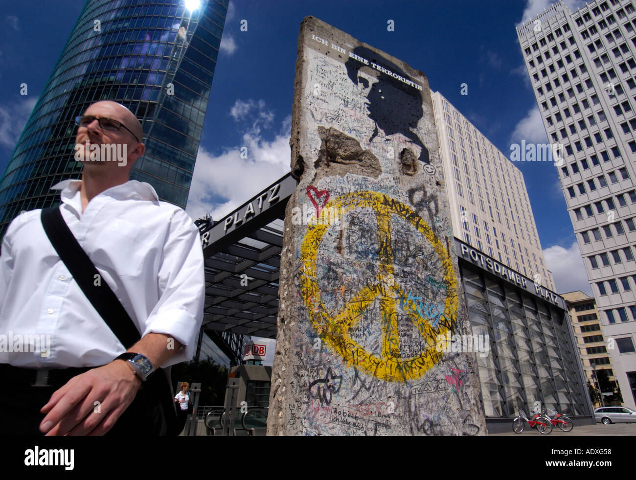 Section of original Berlin Wall and office buildings in Potsdamer Platz ...