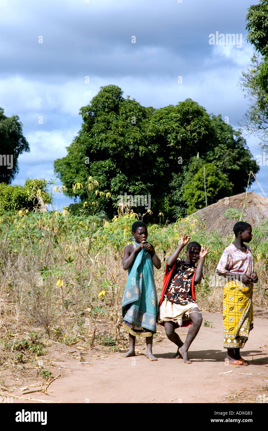 Three black african children dancing hi-res stock photography and ...