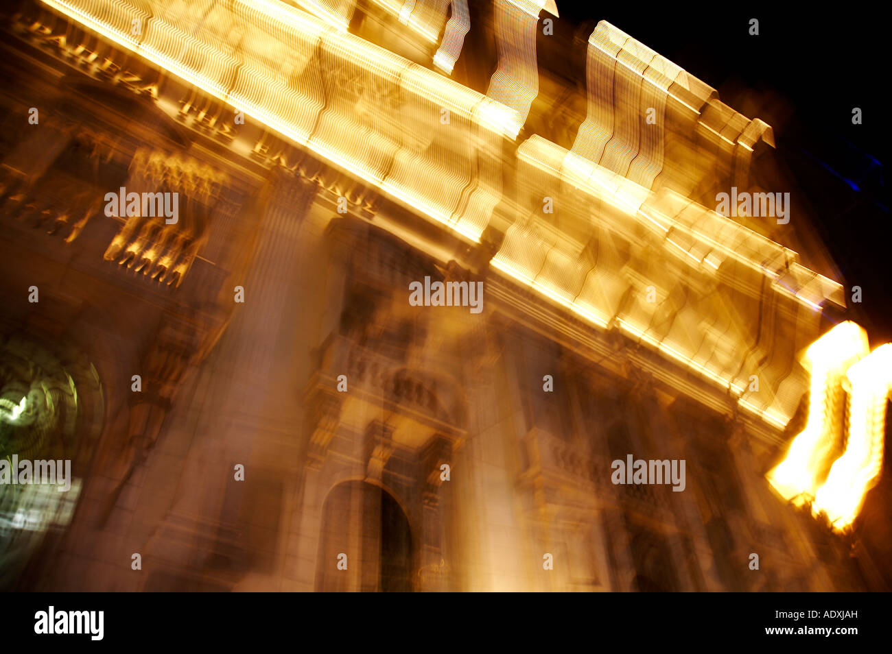 Bank illuminated at night Stock Photo - Alamy