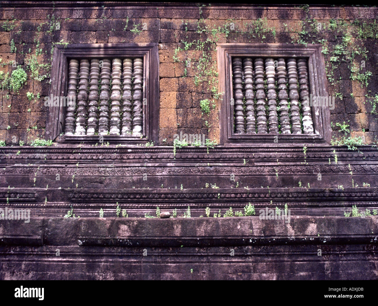 Typical Khmer style stone barred windows at Wat Phou in southern Laos ...