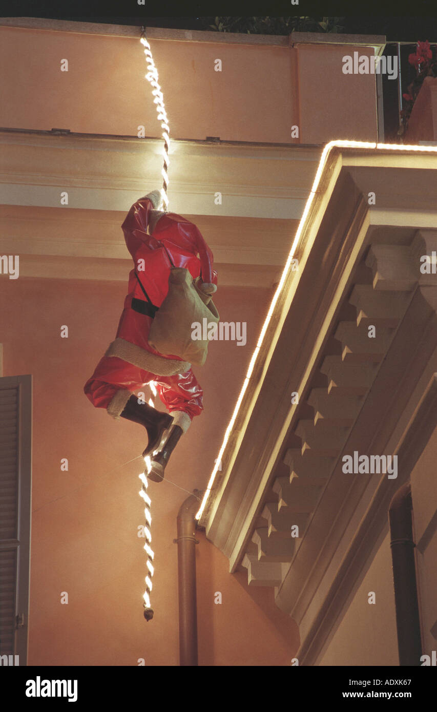 Father Christmas Santa Climbing Up High Resolution Stock Photography ...
