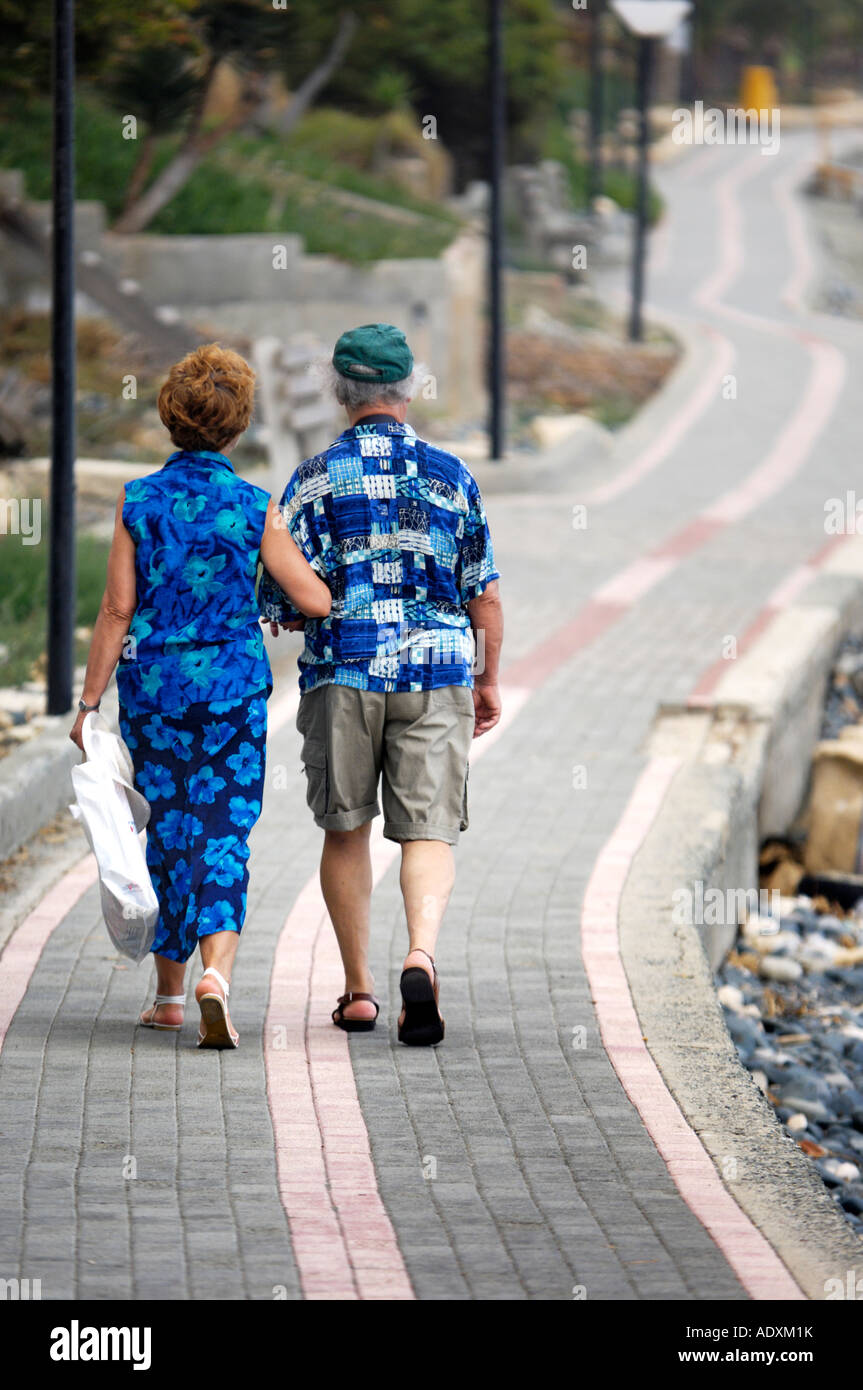 Couple stroll along pathway hi-res stock photography and images - Alamy