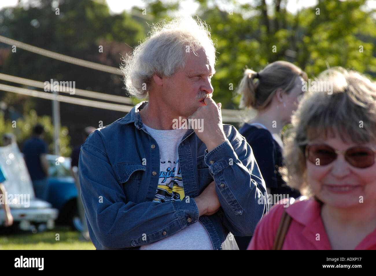 Spectators at outdoor car show Stock Photo - Alamy