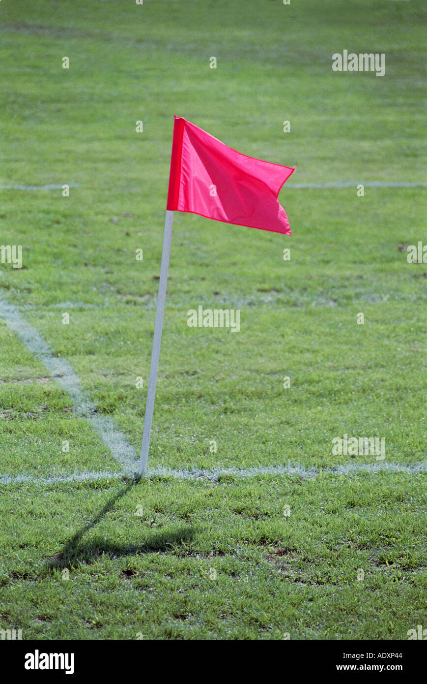 red flag flying on sports field Stock Photo - Alamy