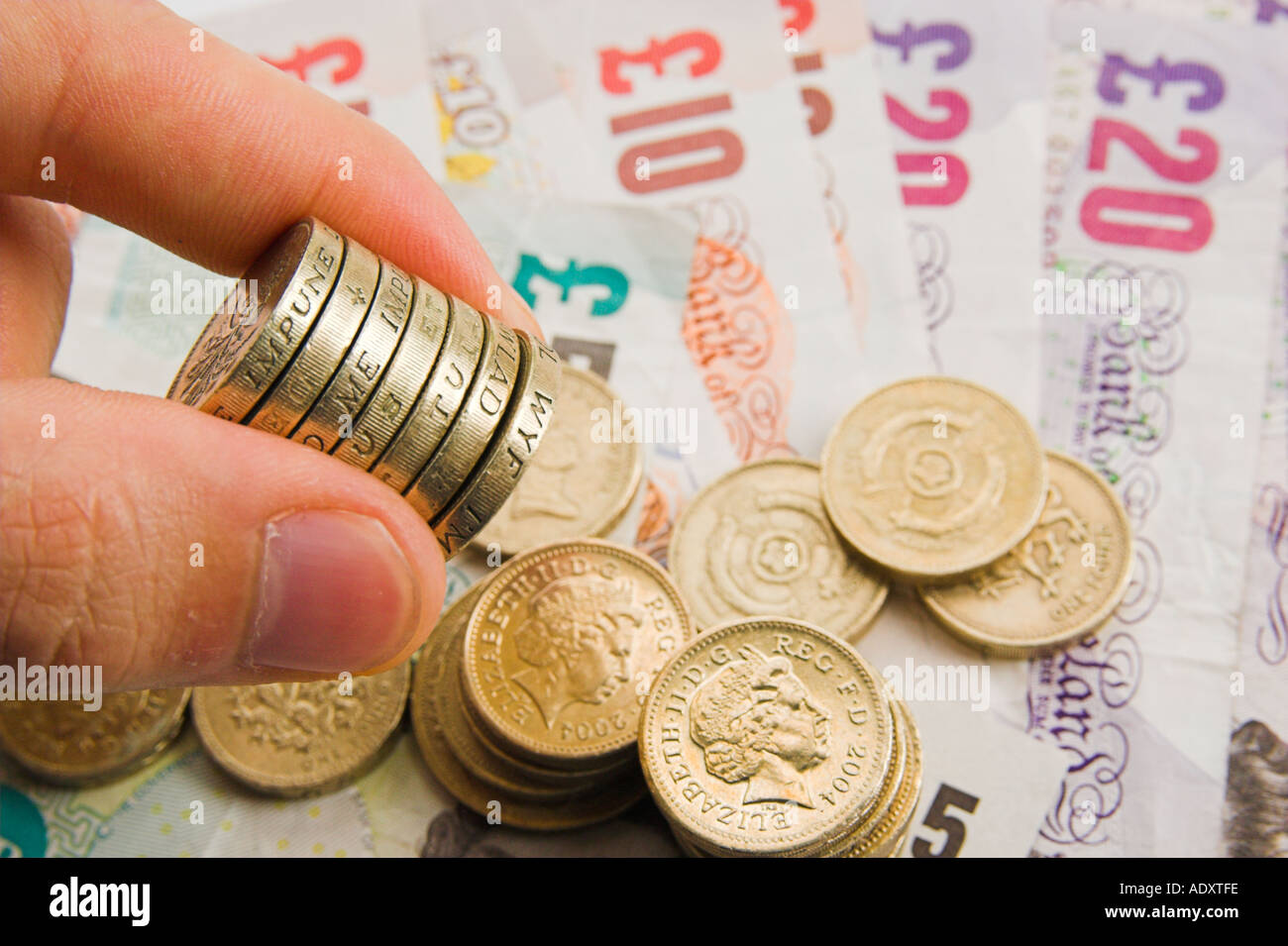 Five and ten pound notes hand hi-res stock photography and images - Alamy