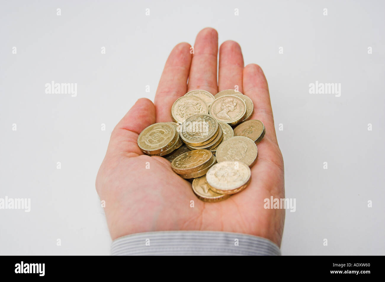Hand money sterling hi-res stock photography and images - Alamy