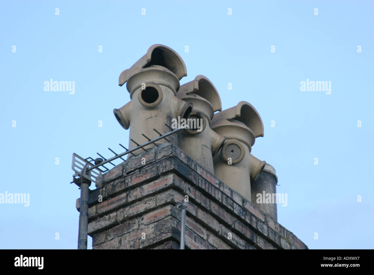 Cowl type chimneys on coastal cottages to prevent birds nesting and ...