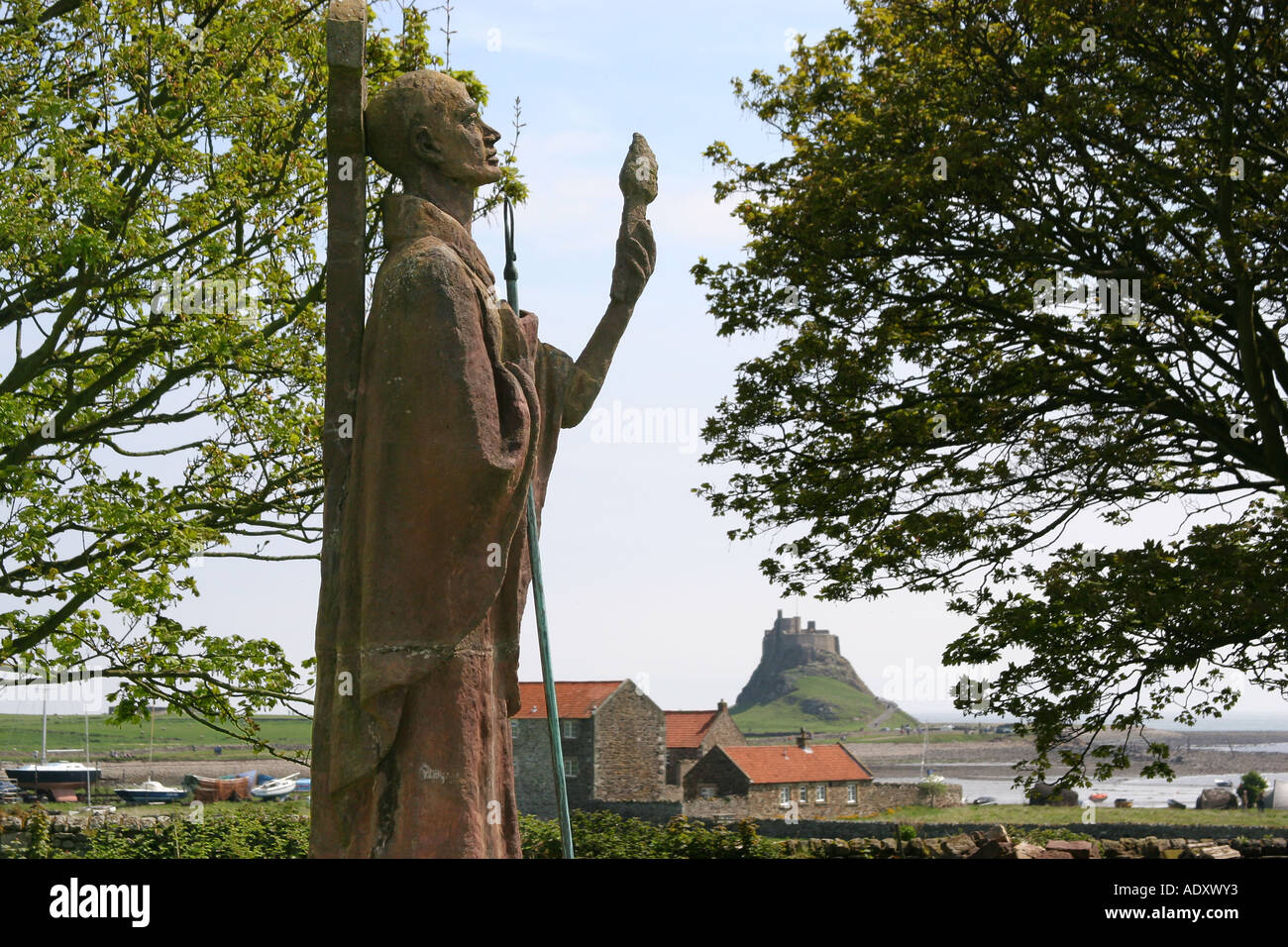 Statue of Saint Cuthbert in priory grounds on Holy Island ...