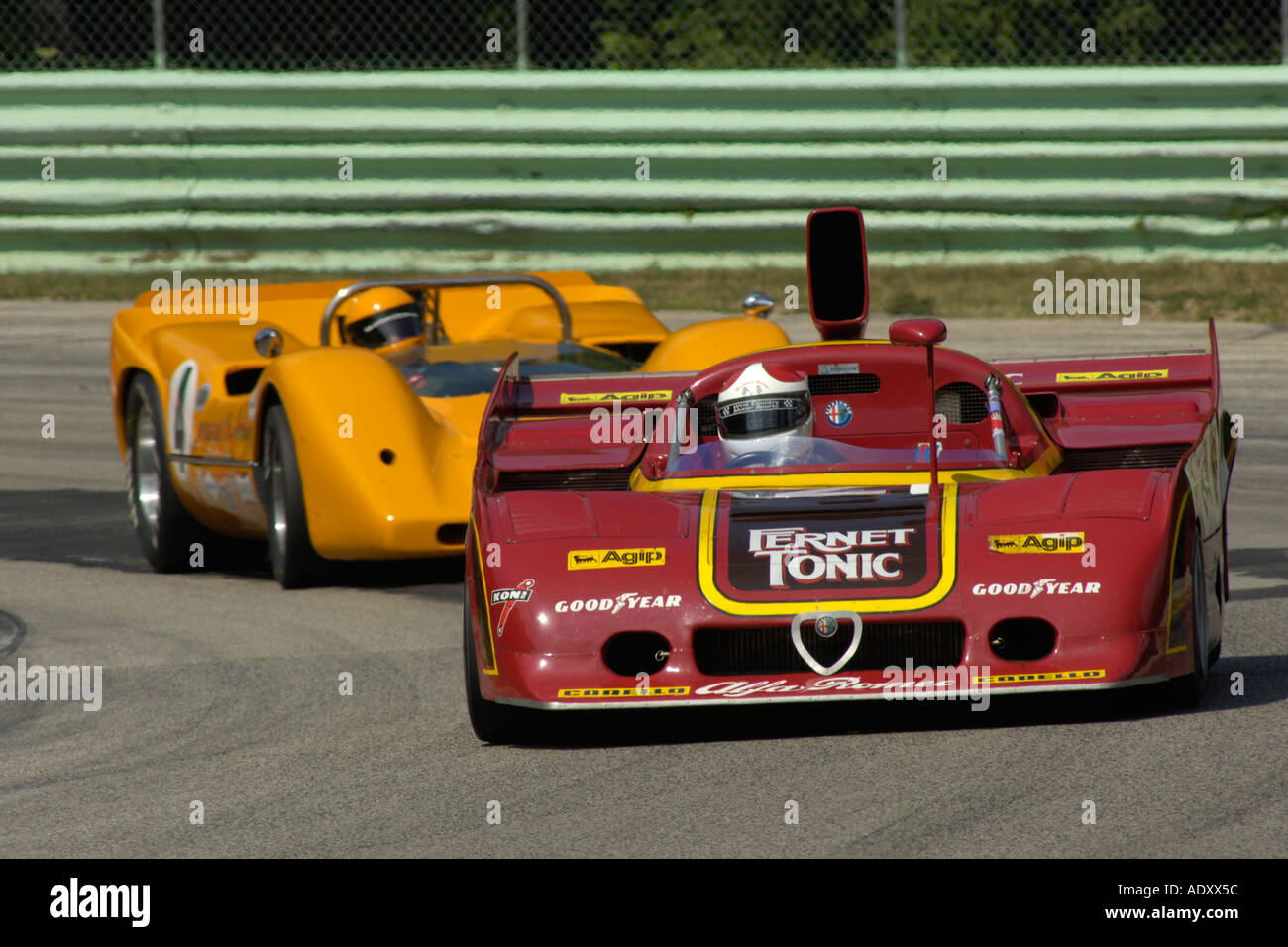 Joe Nastasi in his 1973 Alfa Romeo T 33 is followed by Harry Mathews in ...