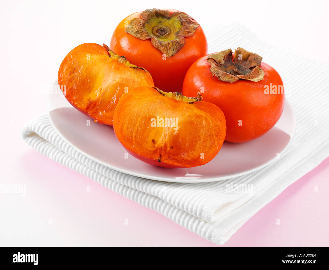 Whole sharon fruit hi-res stock photography and images - Alamy