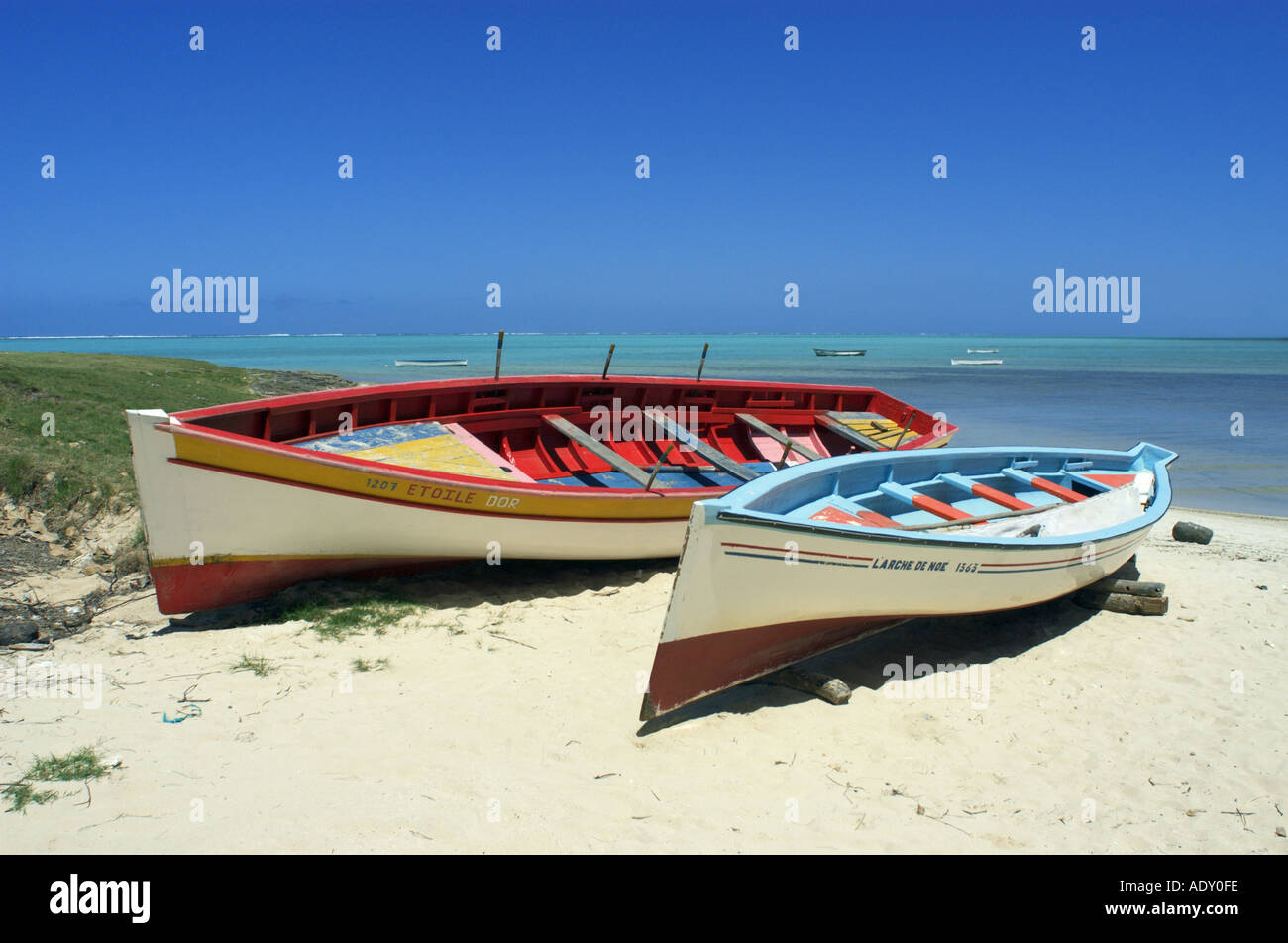 two fishing boats stranded on beach Stock Photo - Alamy