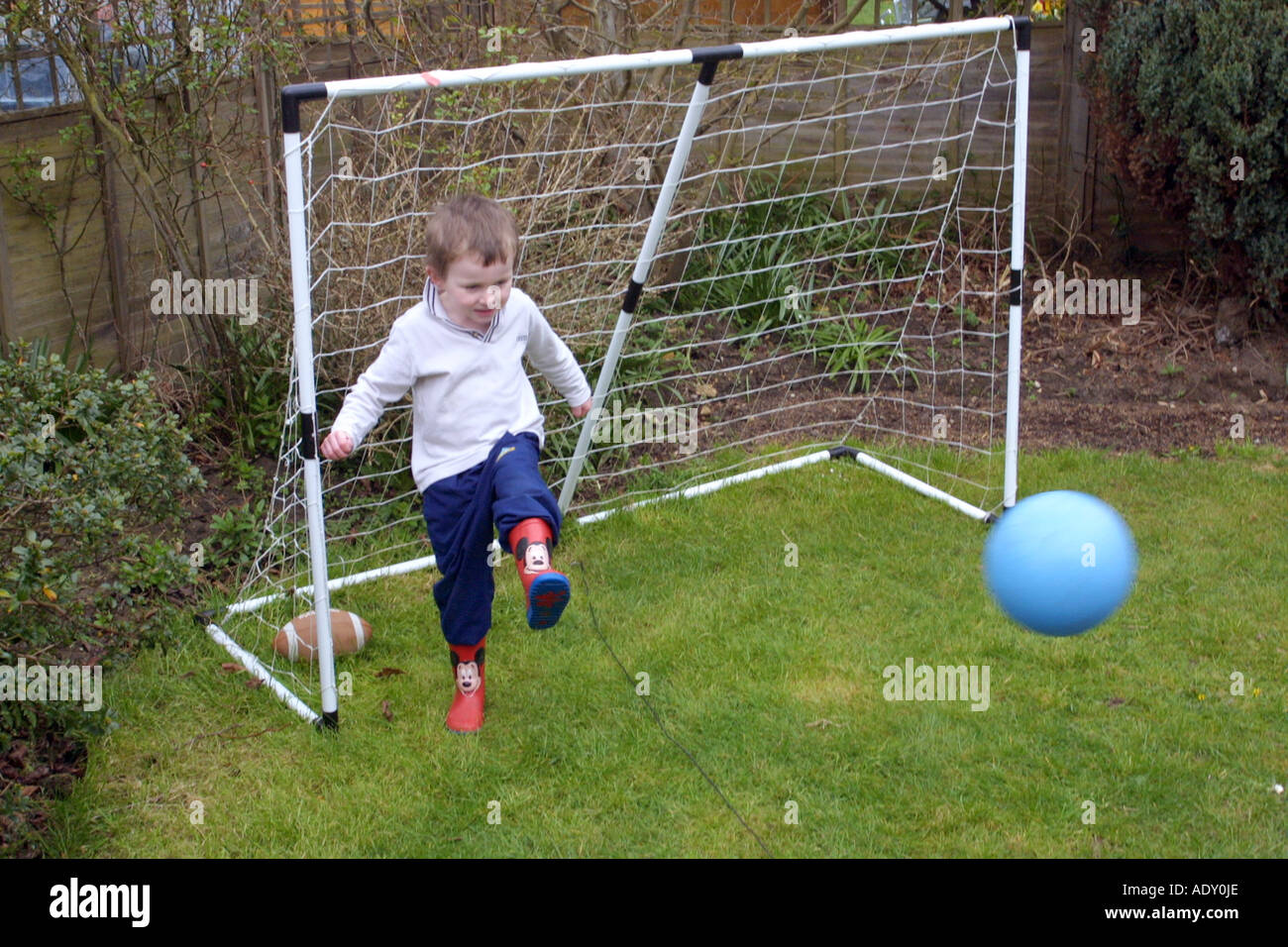 Football in the back garden hi-res stock photography and images - Alamy