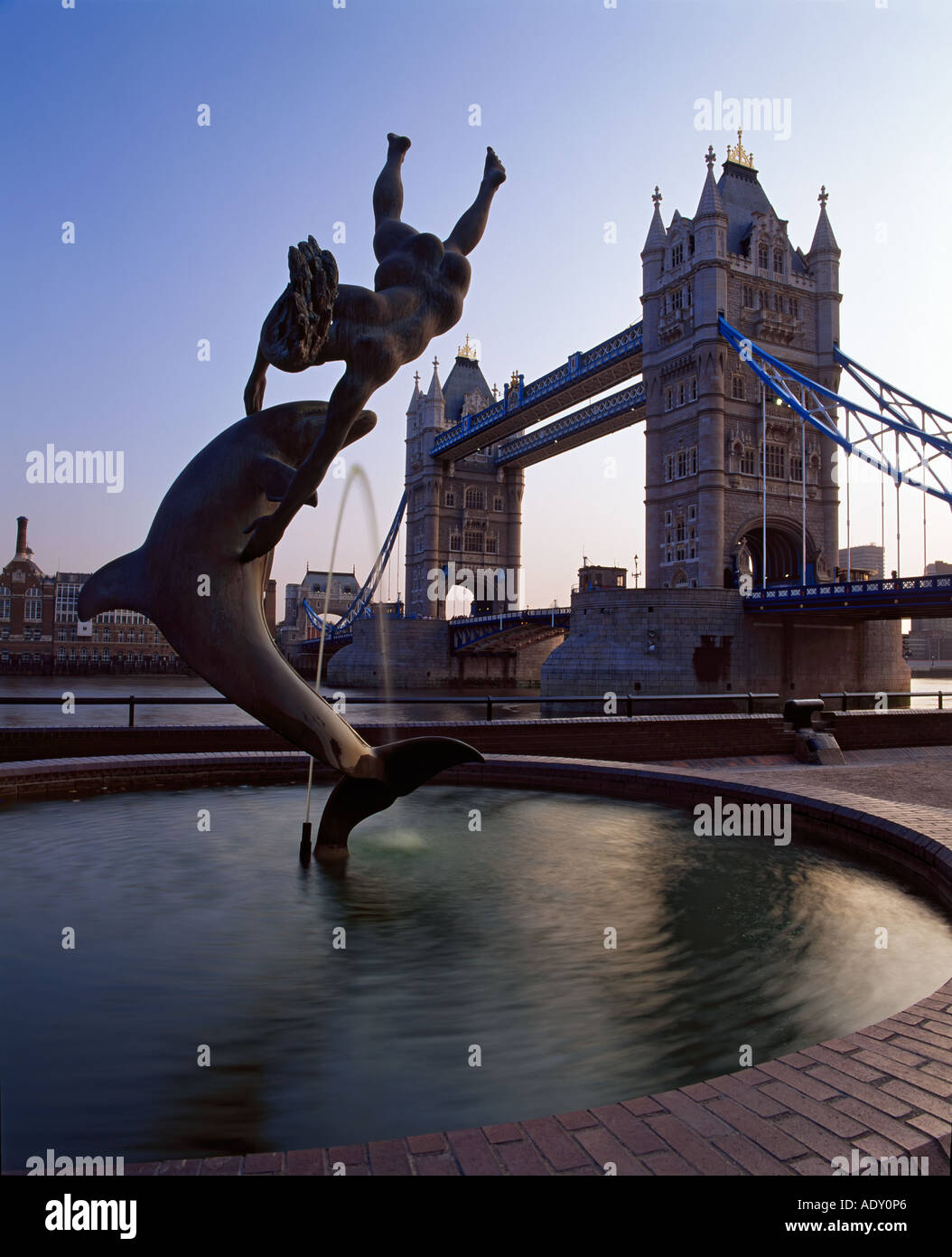 Dolphin and boy fountain with Tower Bridge behind London England Stock ...