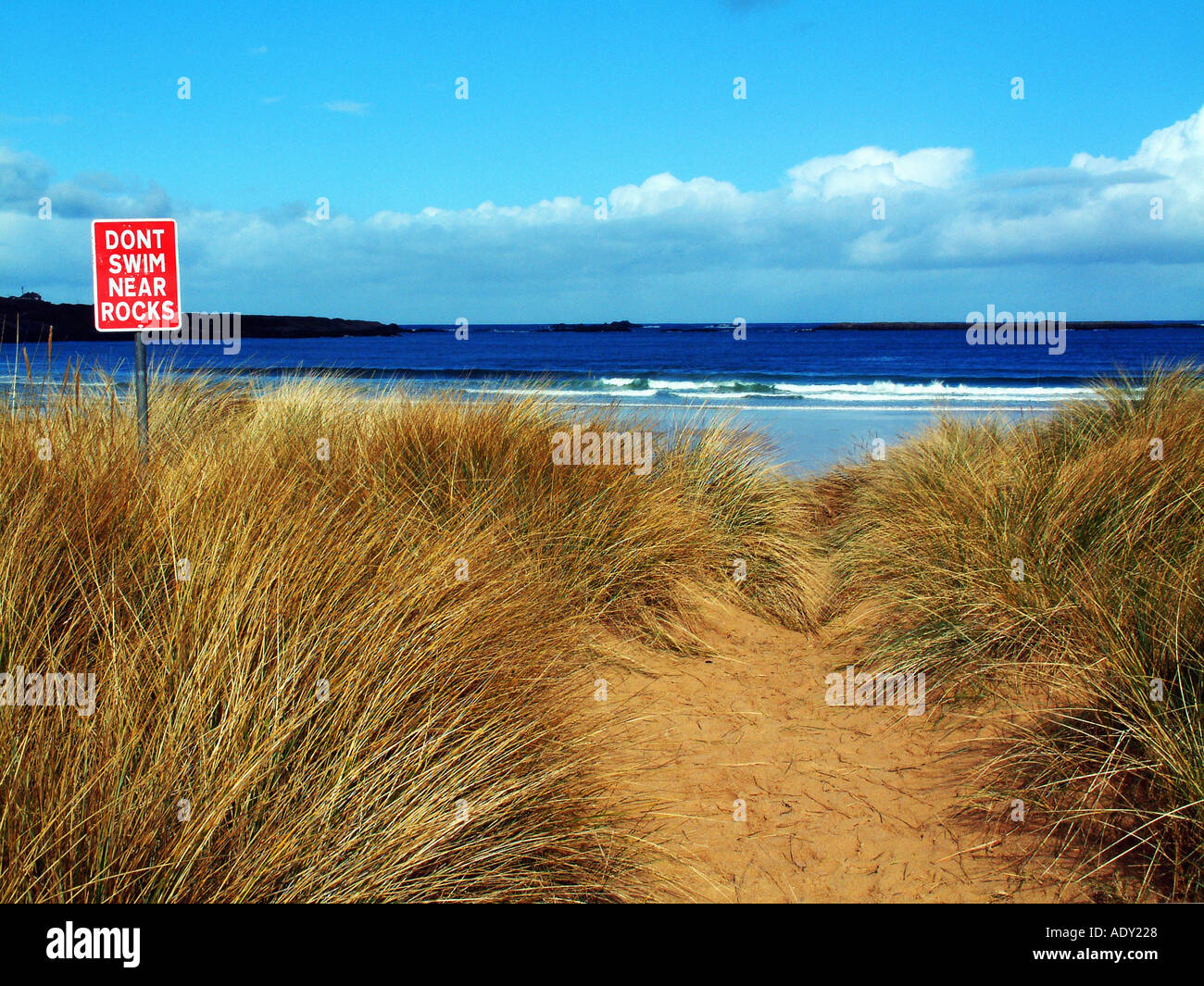 Beach with Warning Sign Stock Photo - Alamy