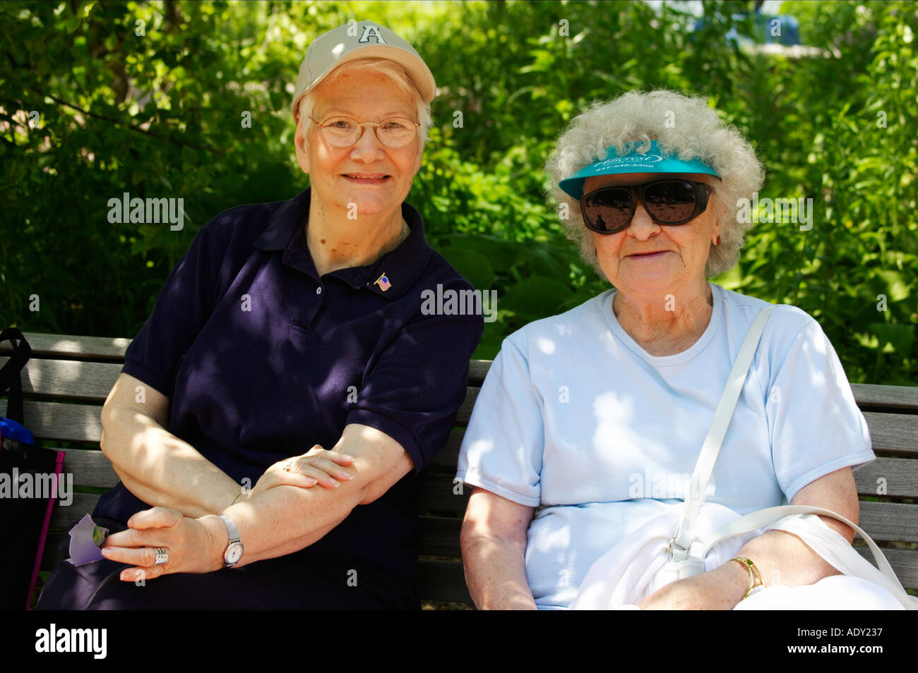 EVENTS Libertyville Illinois Two older ladies sit bench under trees ...