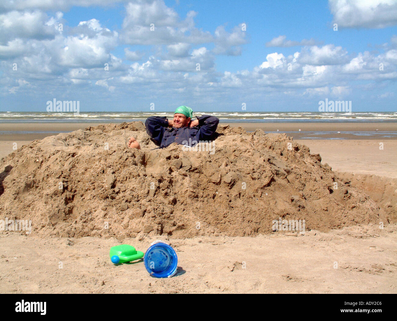 Sandcastle beach adult hi-res stock photography and images - Alamy