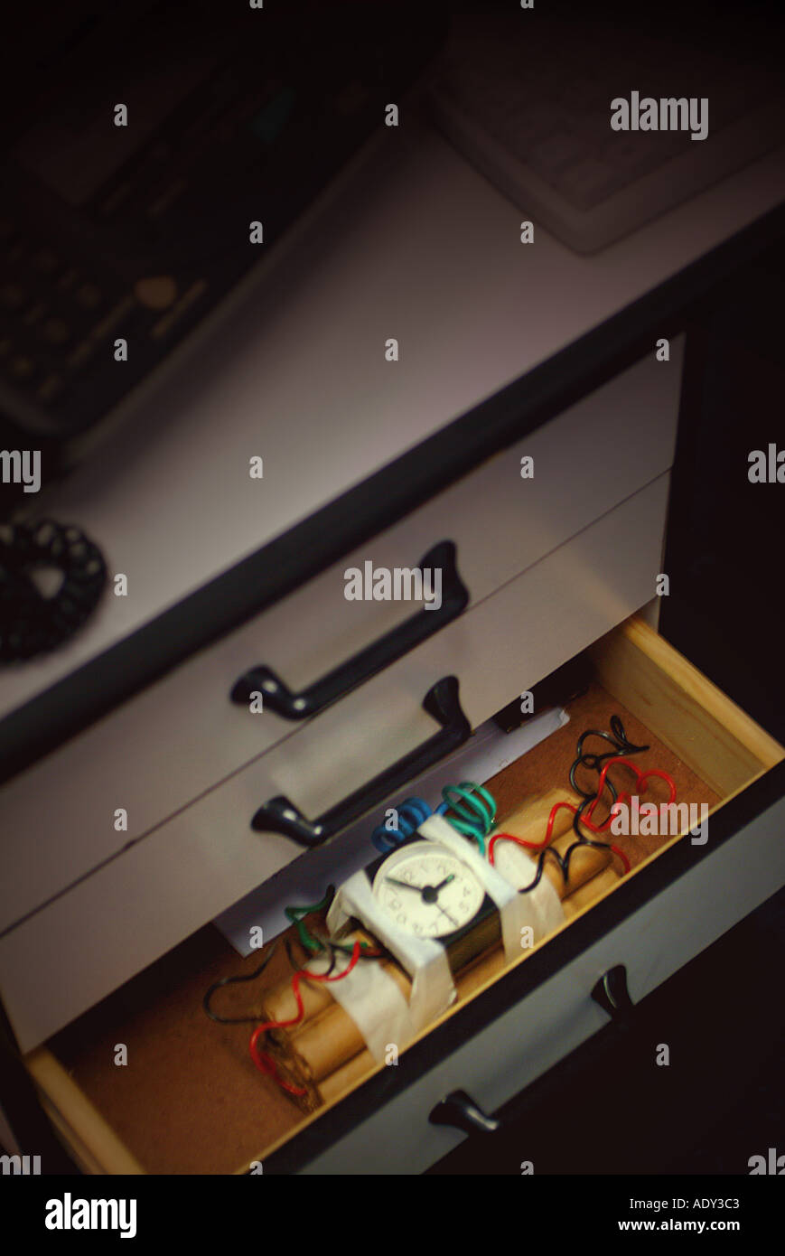 Business Concepts I office desk drawer time bomb device explosion clock ...