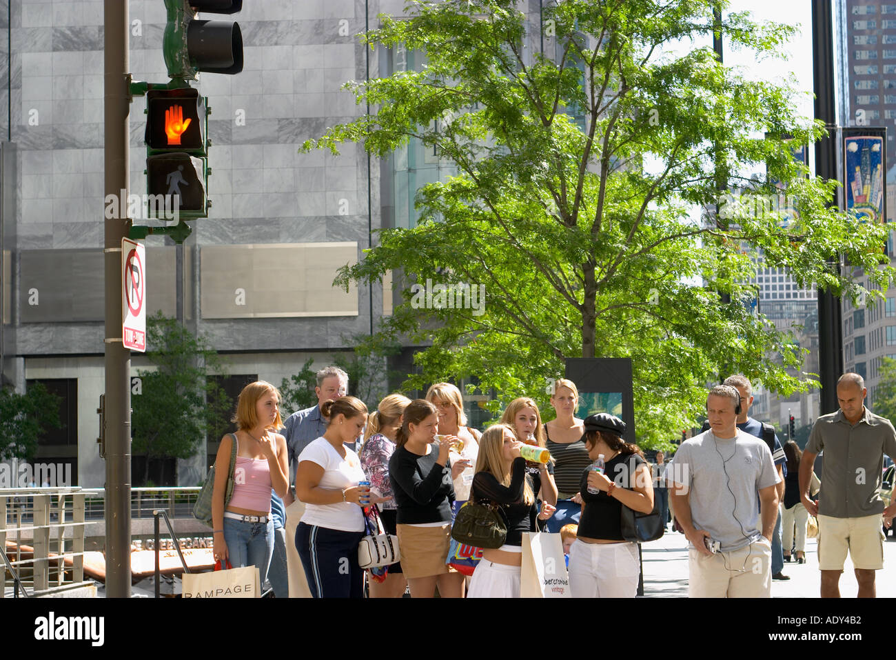 STREET SCENE Chicago Illinois Pedestrians wait for walk signal downtown ...