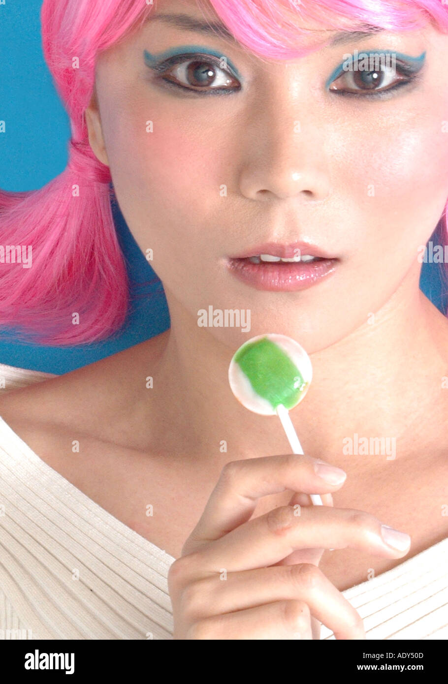 Model holding a lolly Stock Photo - Alamy
