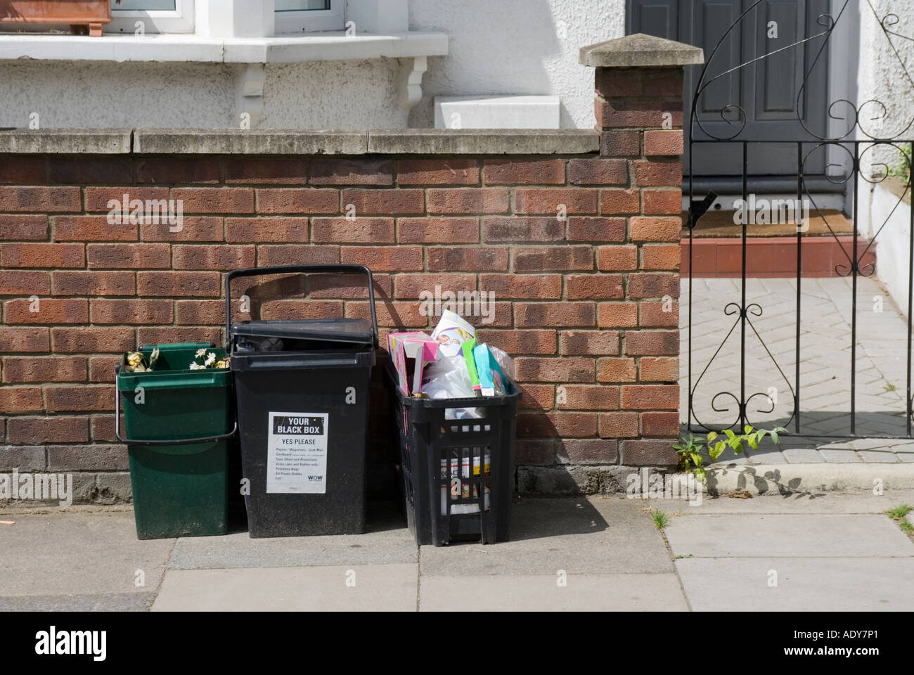 Rubbish bins on the pavement awaiting collection Stock Photo - Alamy
