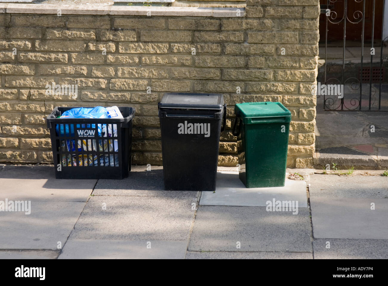 Rubbish bins on the pavement awaiting collection Stock Photo - Alamy