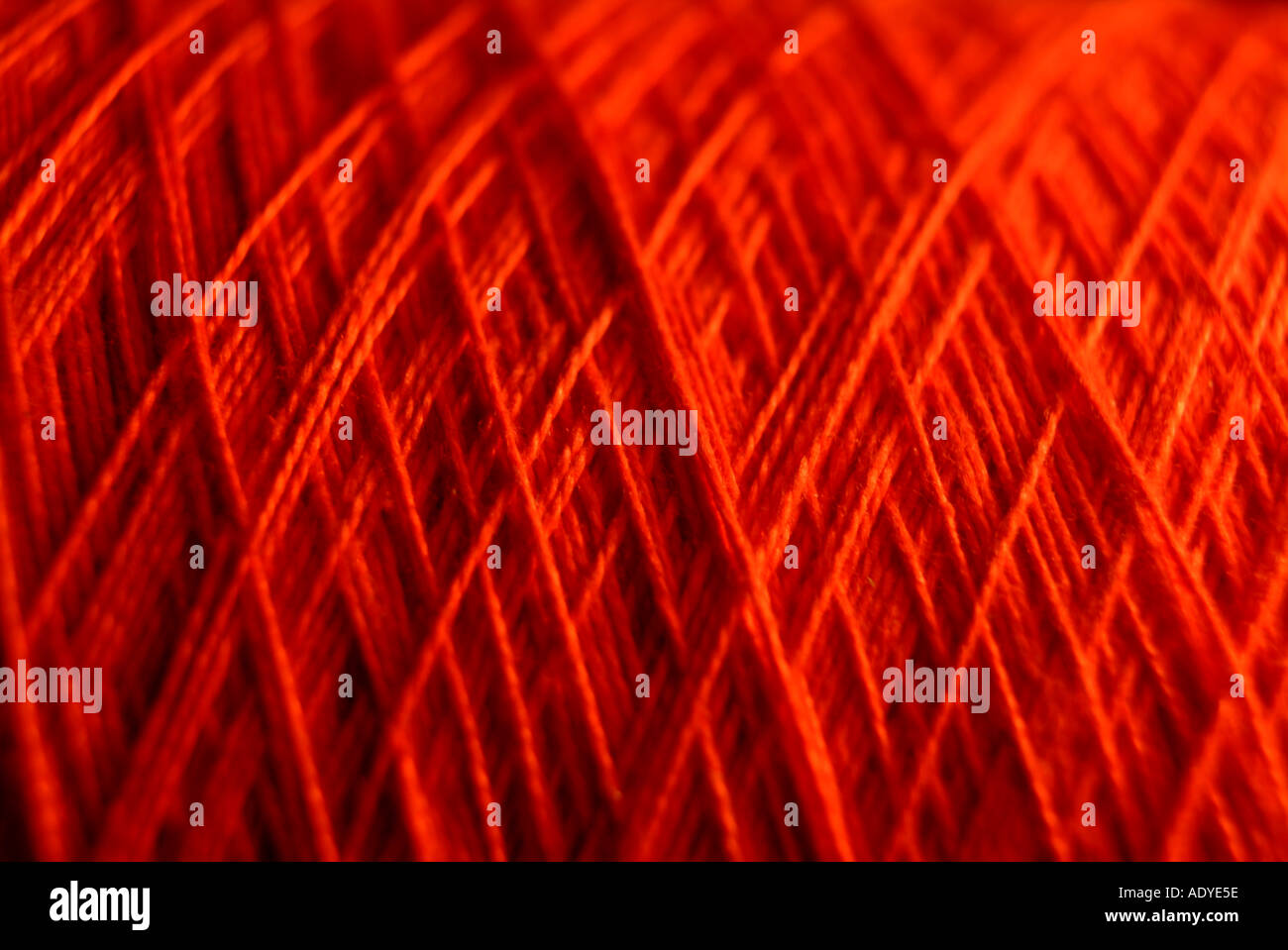 Backgrounds I yarn woven string detail crisscross crisscrossing reddish ...