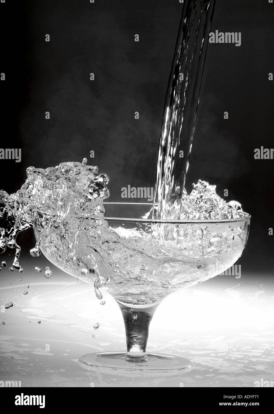 Liquid II water liquid drop droping round blue splash wet aqua glass ...