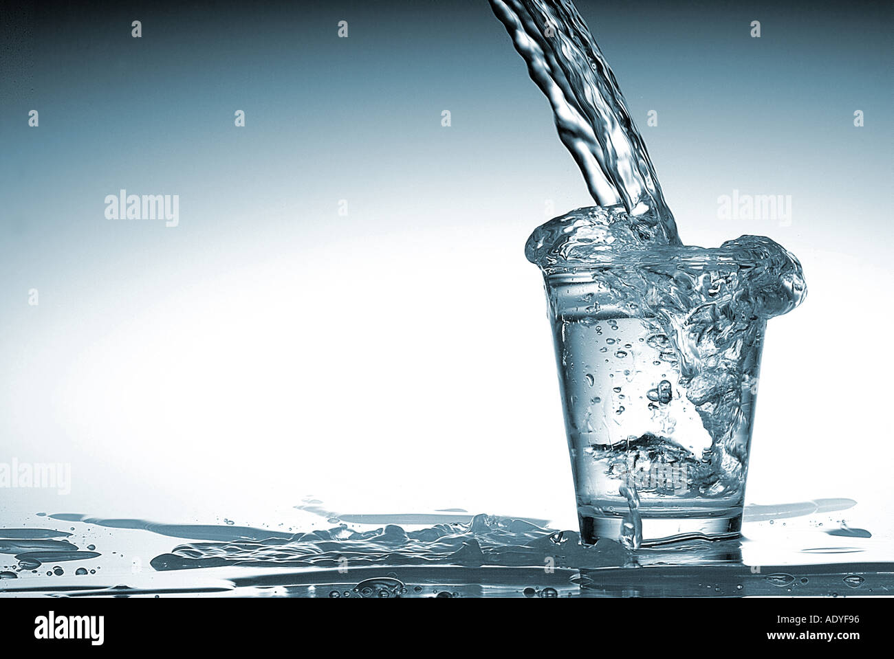 Liquid II water liquid drop droping round blue splash wet aqua glass ...