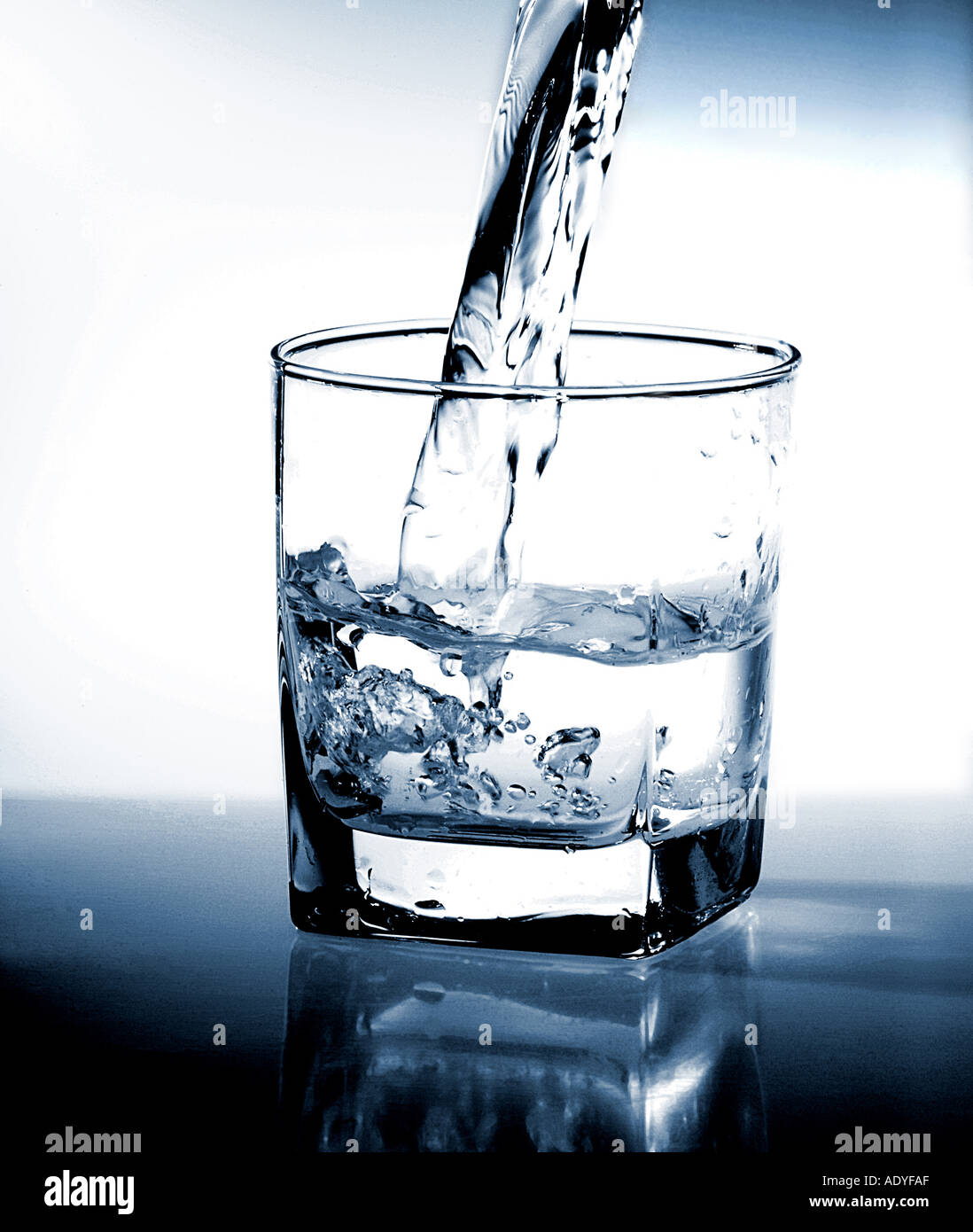 Liquid II water liquid drop droping round blue splash wet aqua glass ...