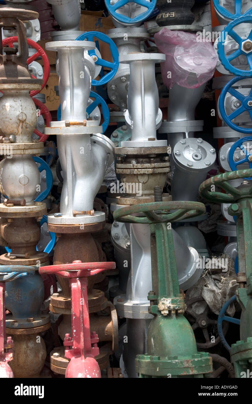 Colourful pipe fittings on display in a Bangkok street Stock Photo - Alamy