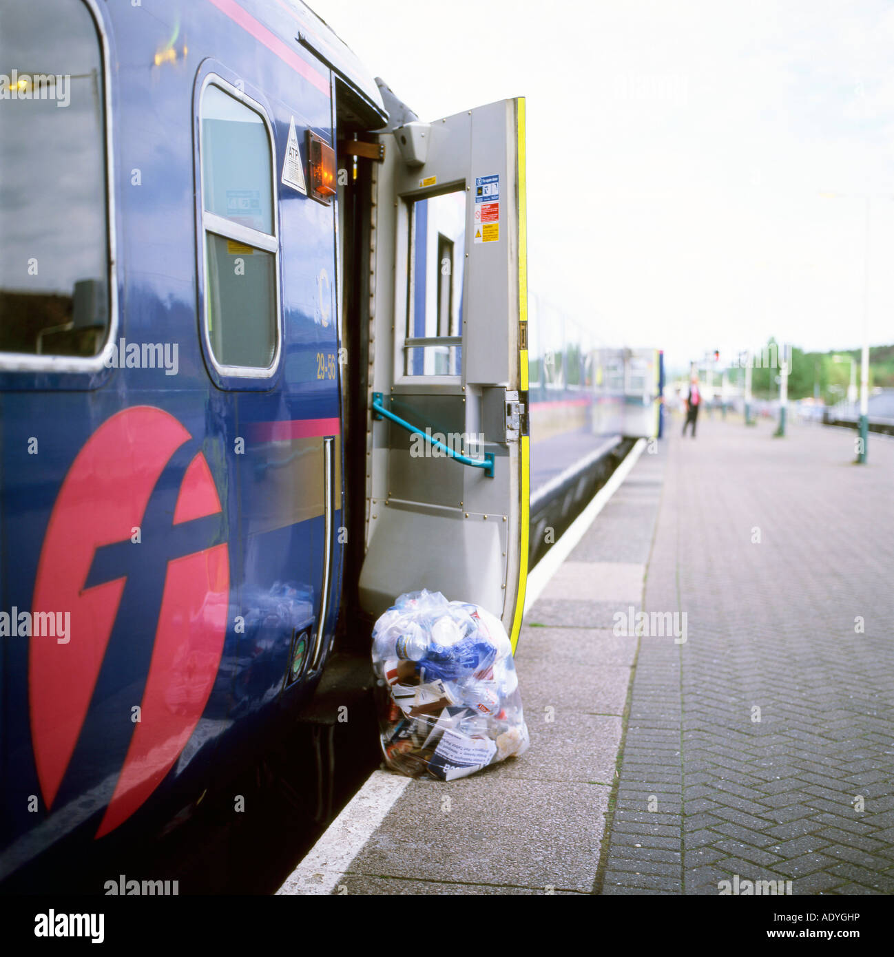First Great Western train with rubbish bag outside door on platform at ...