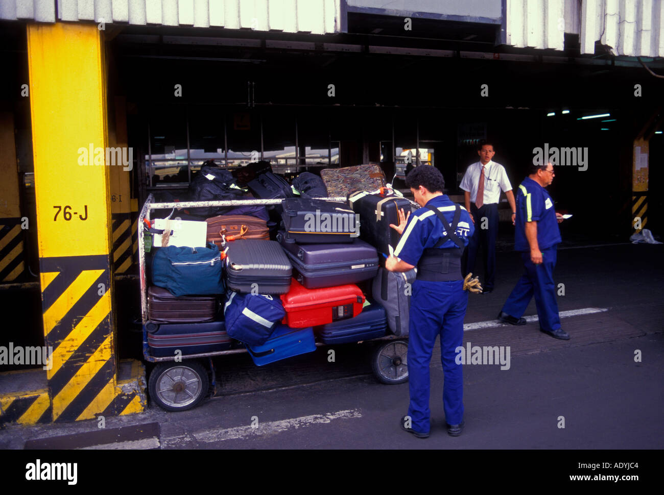 Mexicans, Mexican men, baggage handlers, passenger luggage, Benito ...