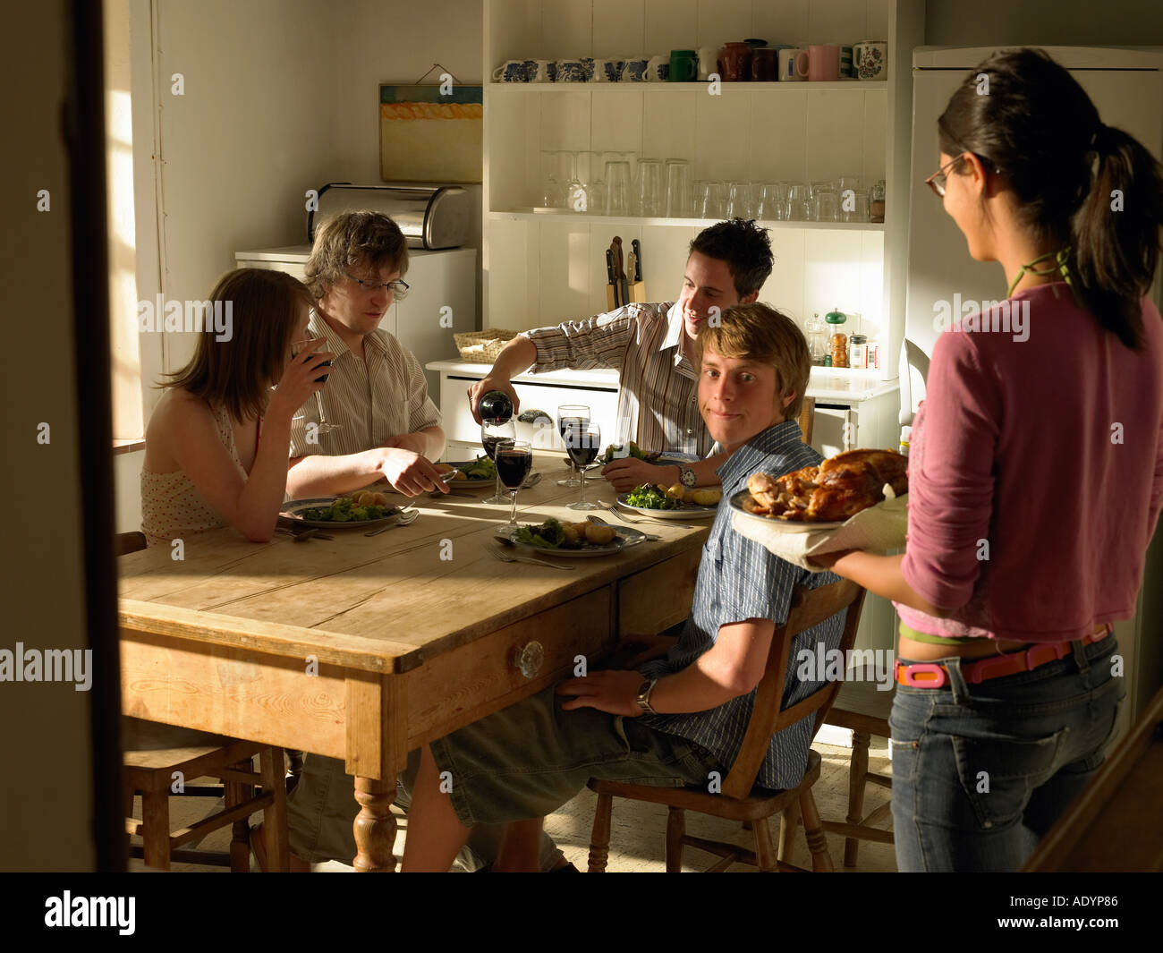 Two couples dinner table hi-res stock photography and images - Alamy