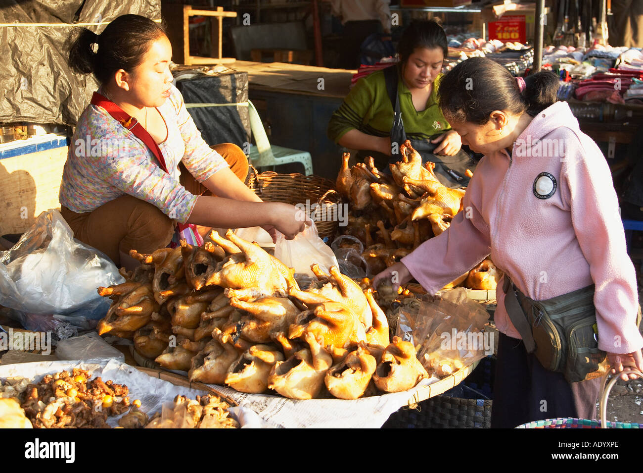 Woman Selling Roast Chicken At Market Stock Photo - Alamy
