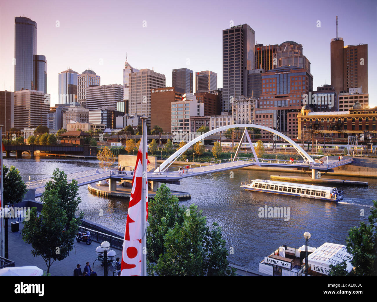 Southgate Complex on Yarra River at sunset under Melbourne Skyline with ...