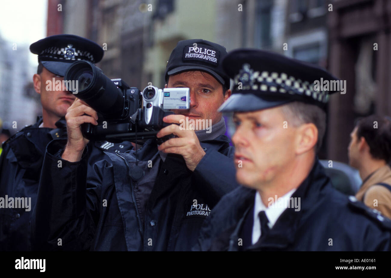 Police and photographer photo hi-res stock photography and images - Alamy