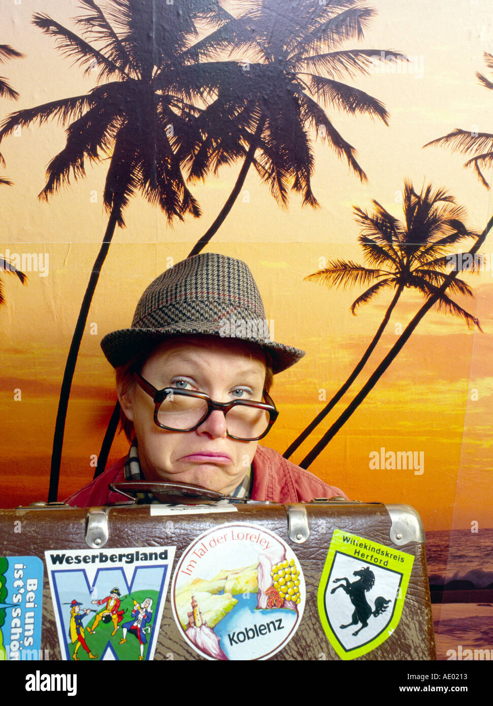 Disappointed tourist in front of Pacific scenery with bag Stock Photo ...