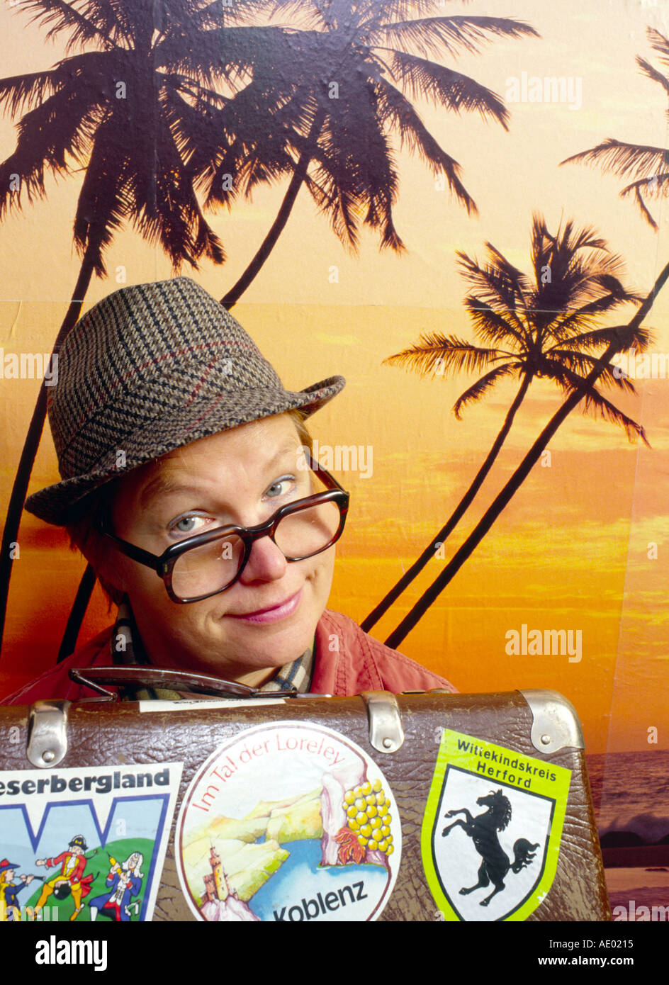 Happy tourist in front of Pacific scenery with bag Stock Photo - Alamy