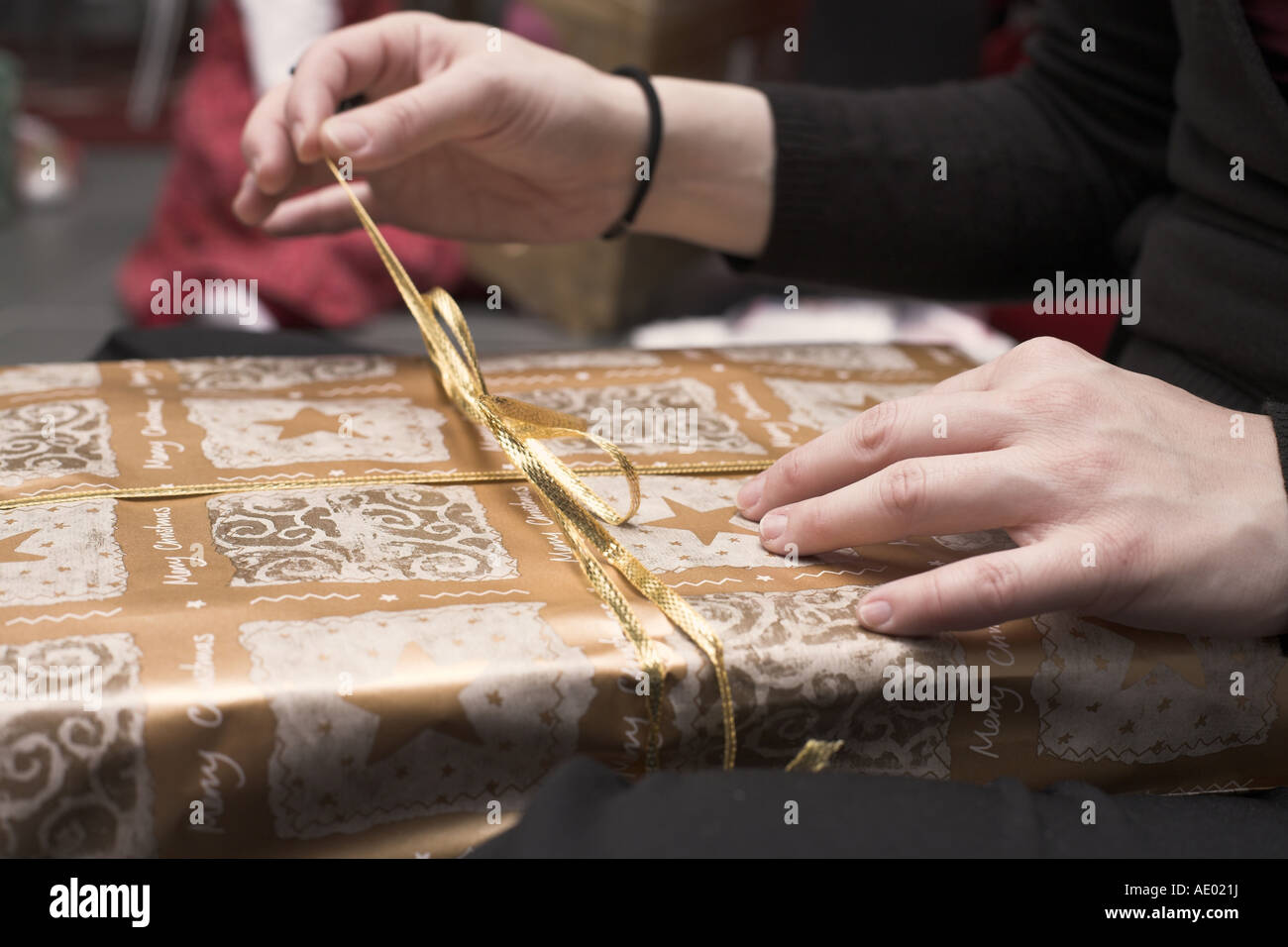 Mess christmas presents wrapping paper hi-res stock photography and ...