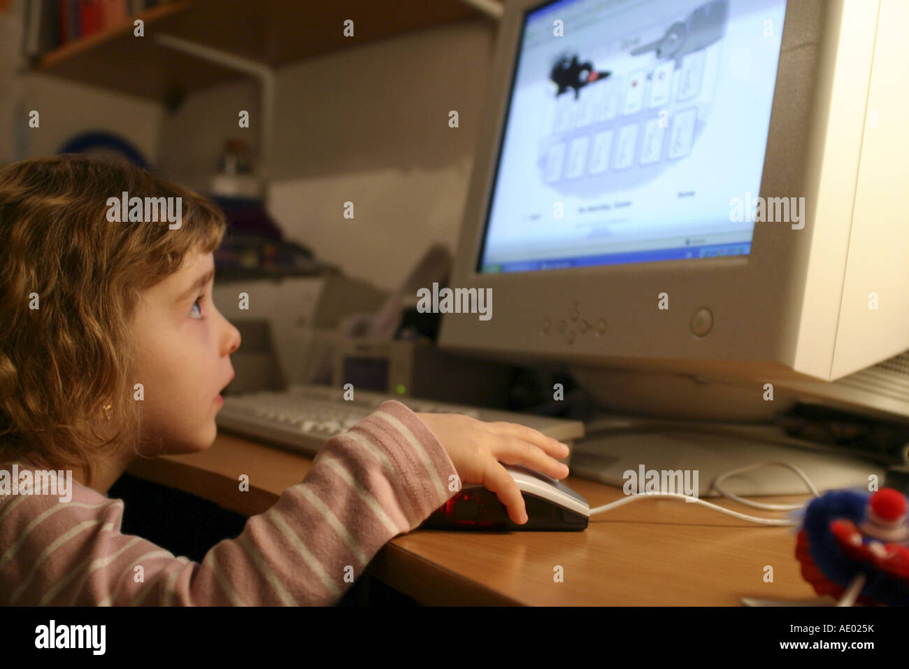 child playing computer games Stock Photo - Alamy