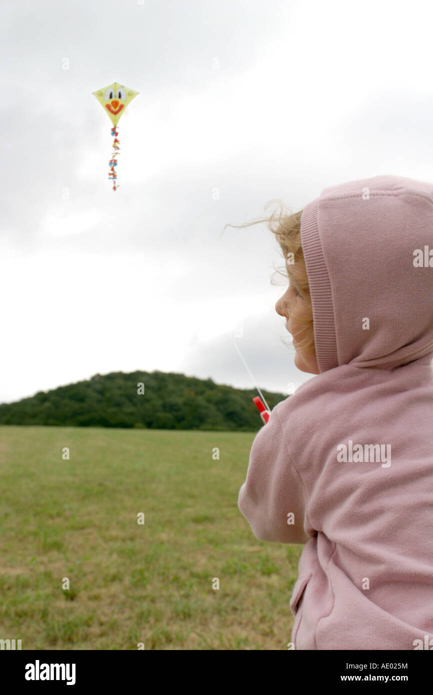 kite flying by a child Stock Photo - Alamy