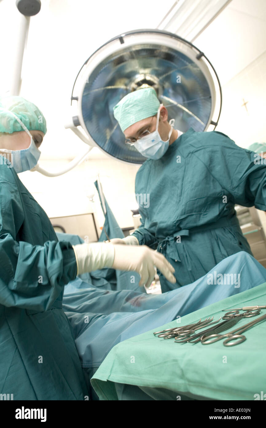 Surgical team operating room vertical hi-res stock photography and ...