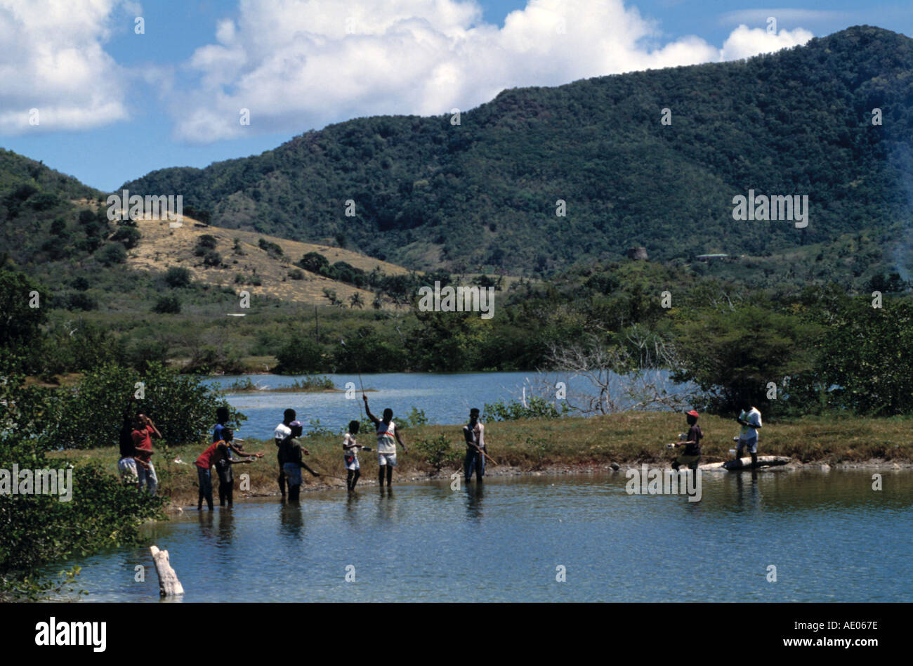 Antigua Fishing in the lagoon behind Darkwood Beach with the rain ...