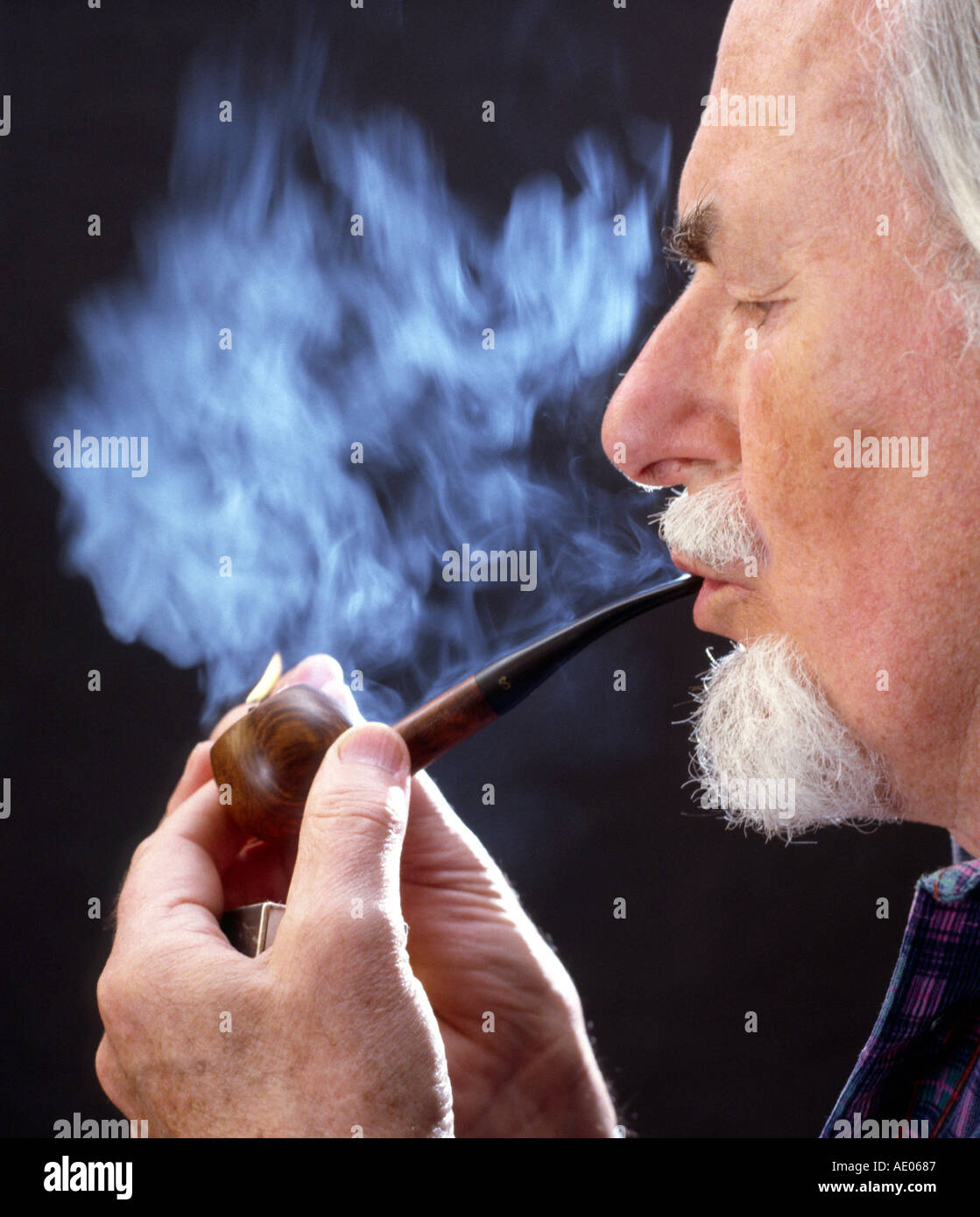 man smoking a pipe Stock Photo - Alamy