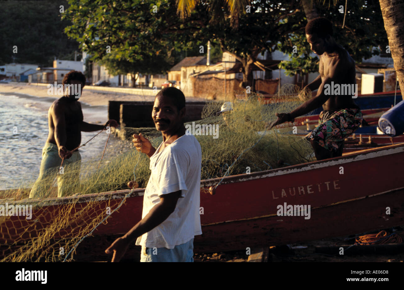 Martinique Fishermen preparing nets at Anse d Arlets Stock Photo - Alamy